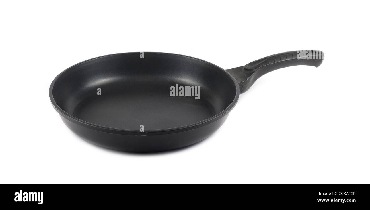 Metal black frying pan with a non stick coating composition isolated ...
