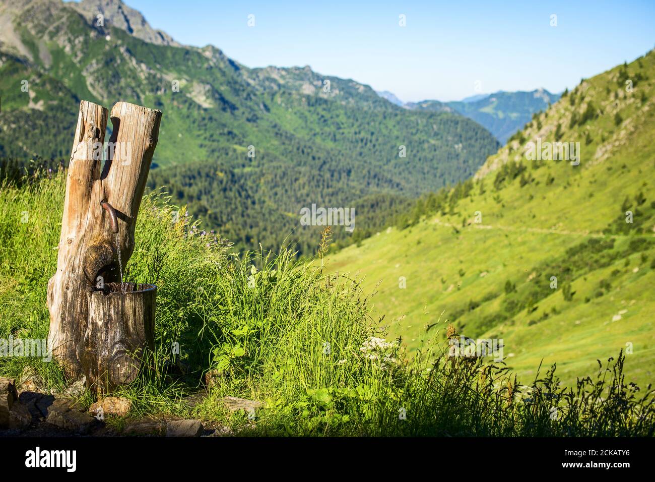 fountain of spring water in mountain durin a trekking Stock Photo - Alamy