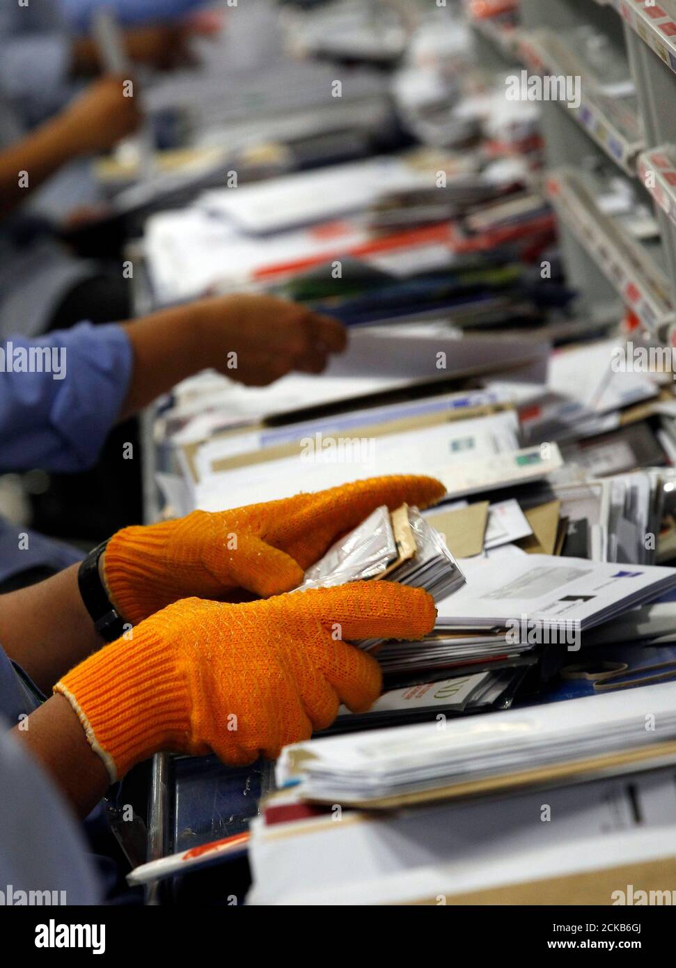Employees sorting letters hi-res stock photography and images - Alamy