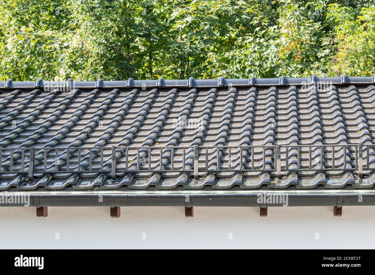 Sunny scenery of a house roof Stock Photo - Alamy