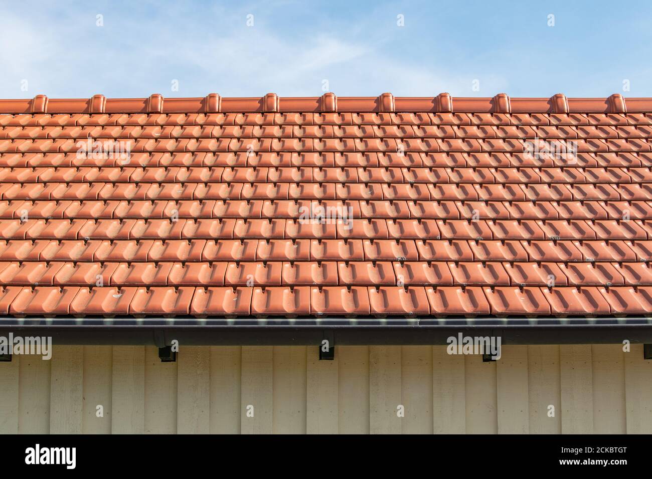 Sunny scenery of a house roof Stock Photo - Alamy