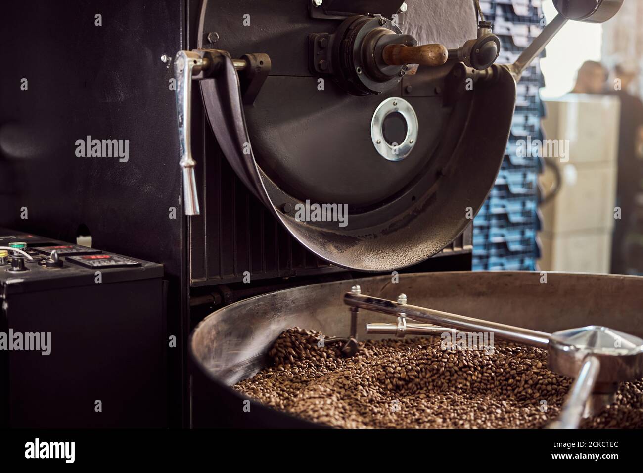 Industrial coffee roasting machine with coffee beans Stock Photo - Alamy