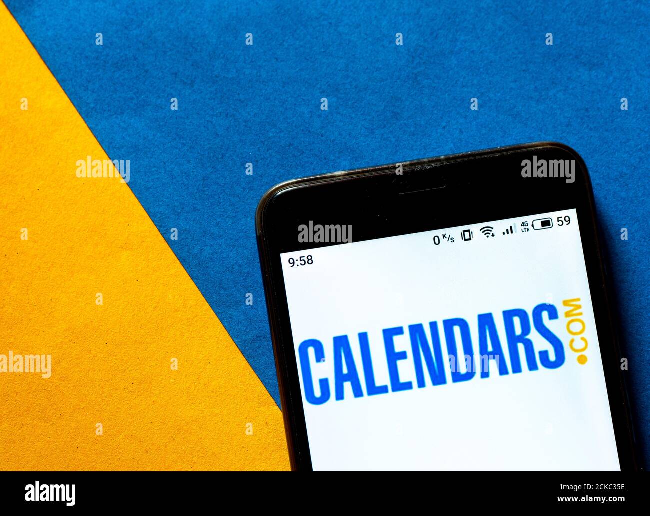 In this photo illustration a Calendars.com logo is seen displayed on a ...