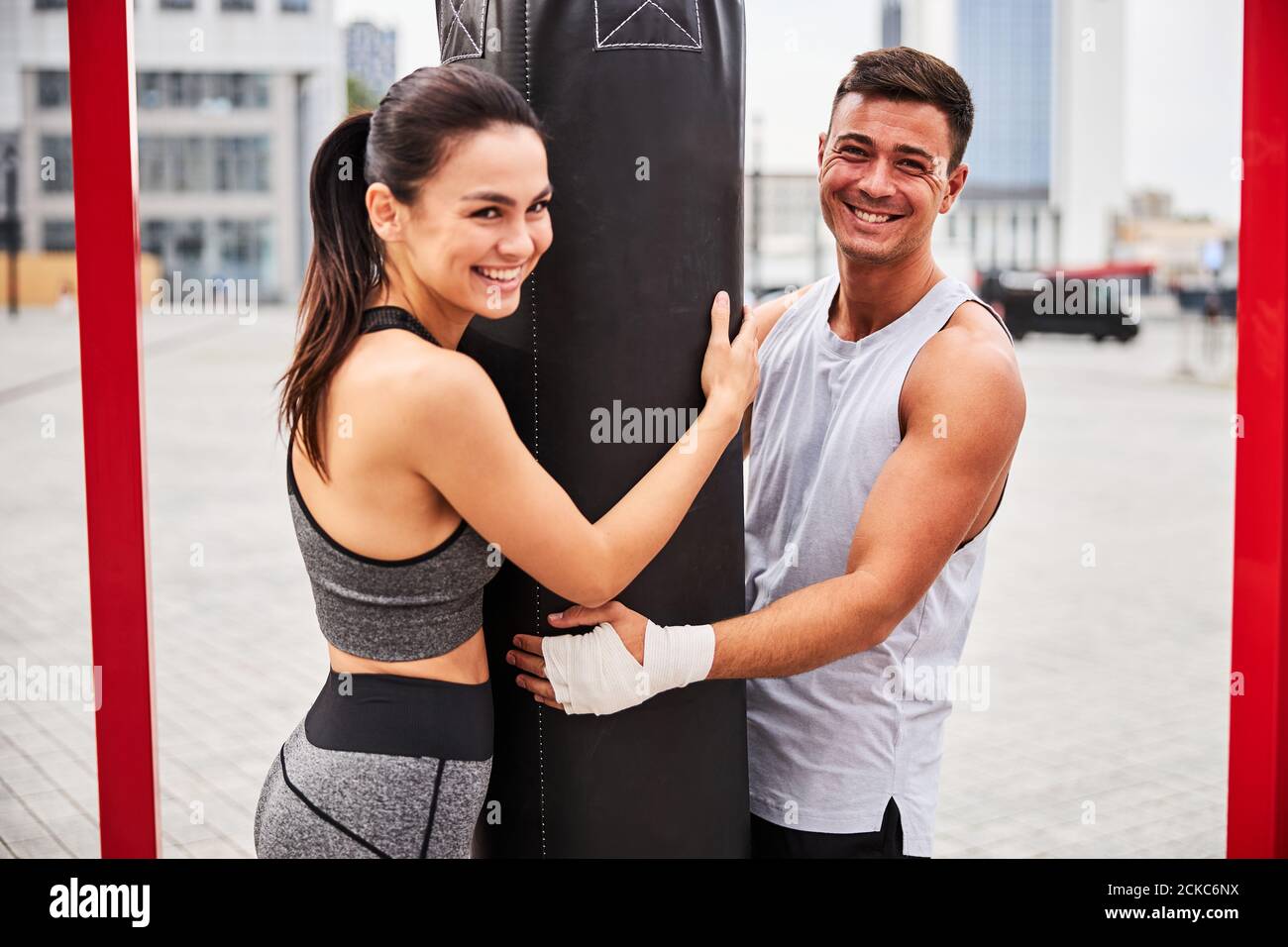Happy young couple during boxing training outdoors Stock Photo - Alamy