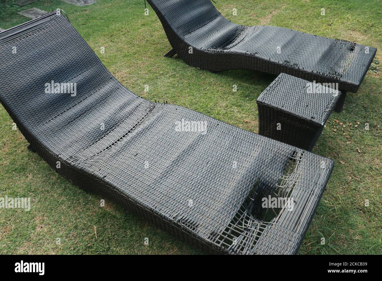 black wicker sun bed isolate with clipping path. old sunbeds in the ...