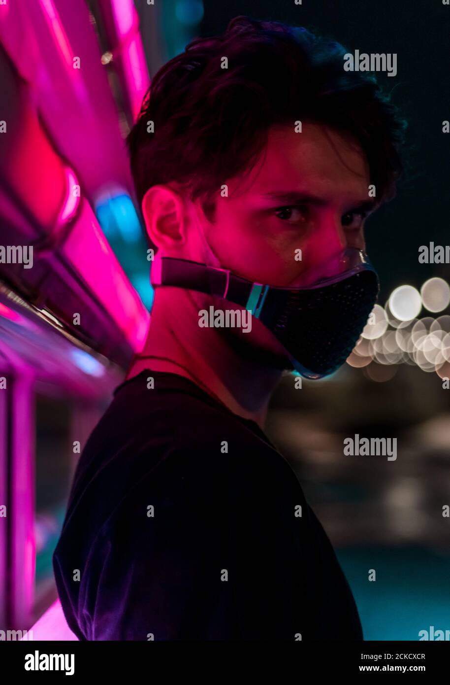 Face young man glowing light hi-res stock photography and images - Alamy