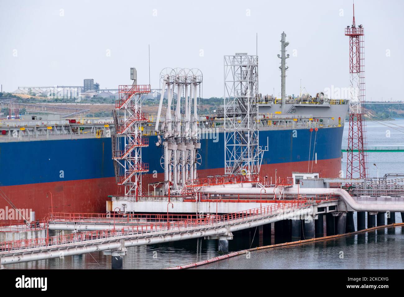 Oil tanker near the loading station at the sea port Stock Photo - Alamy