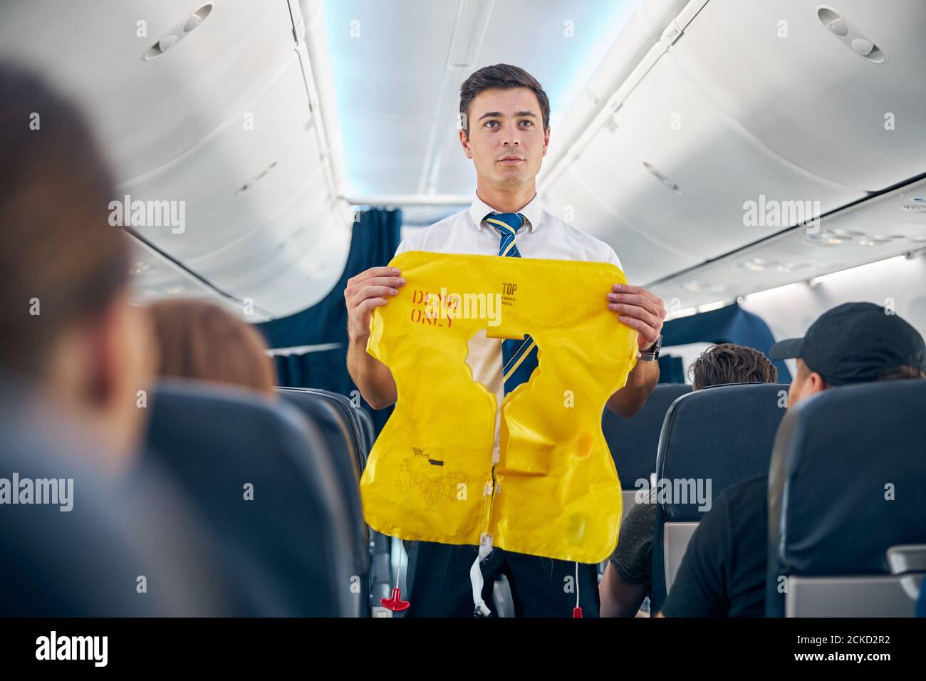 Close up portrait of handsome man talking boarding instructions for ...