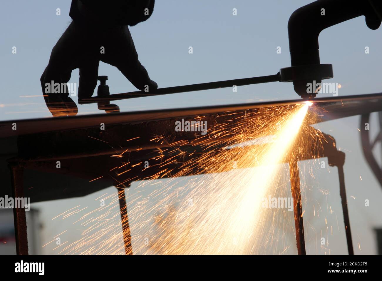 Professional welding worker in factory Stock Photo - Alamy