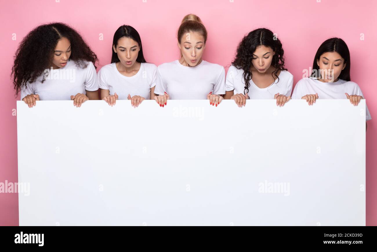 Multiracial Women Holding Blank Poster Board, Mockup, Studio Shot Stock ...