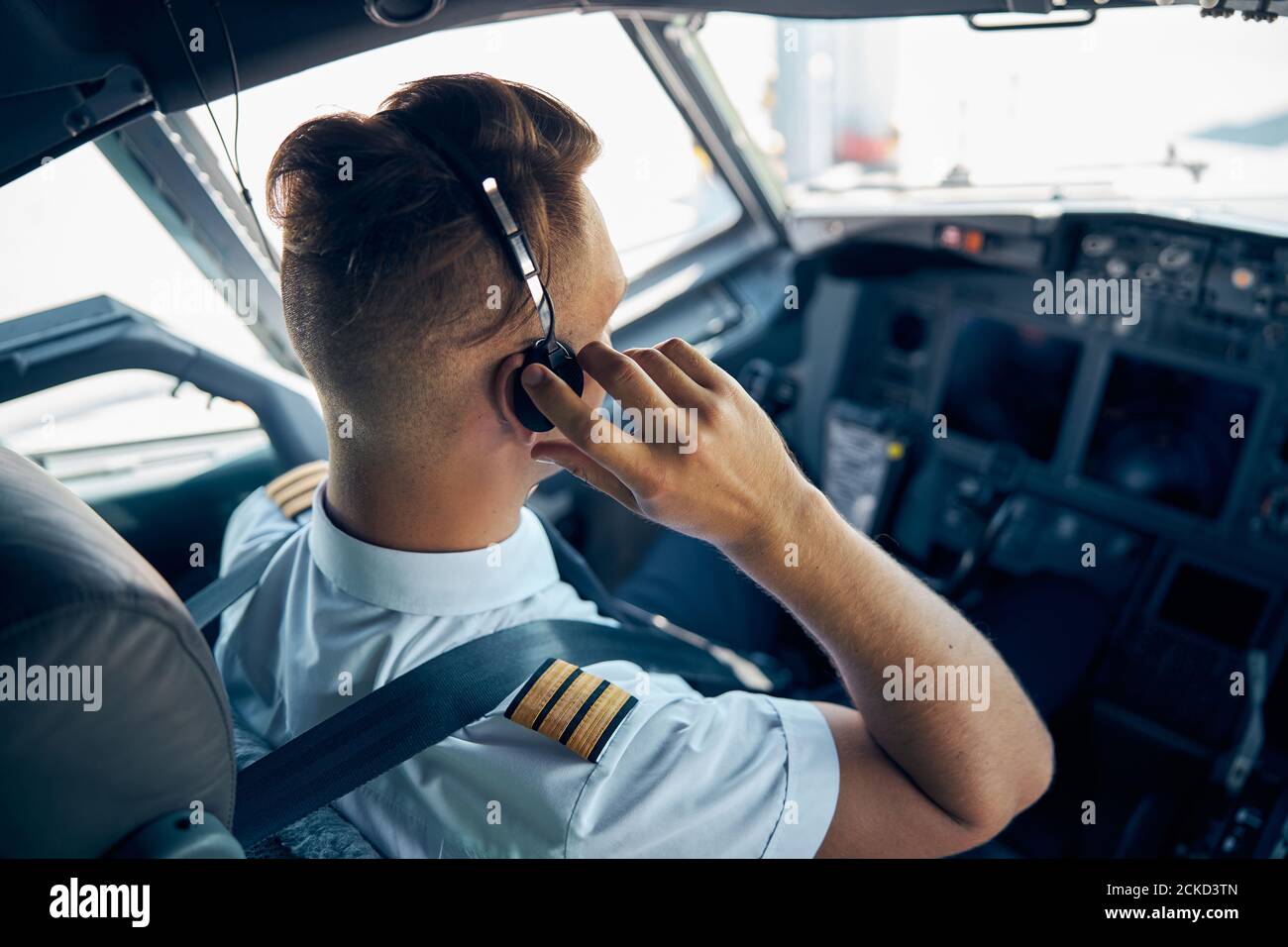 Two pilot get ready for a flight in aircraft Stock Photo - Alamy