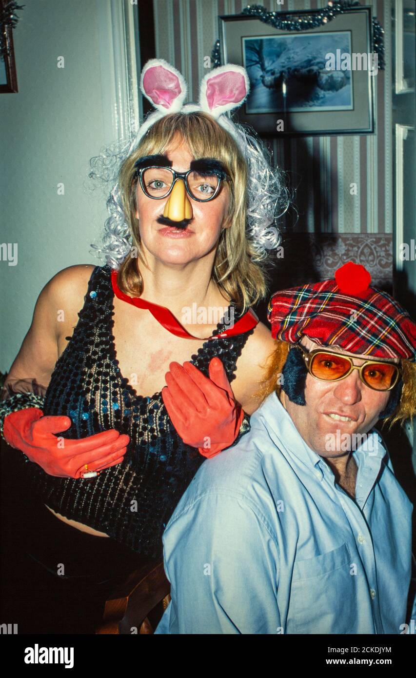 People wearing funny gear at a party Stock Photo - Alamy
