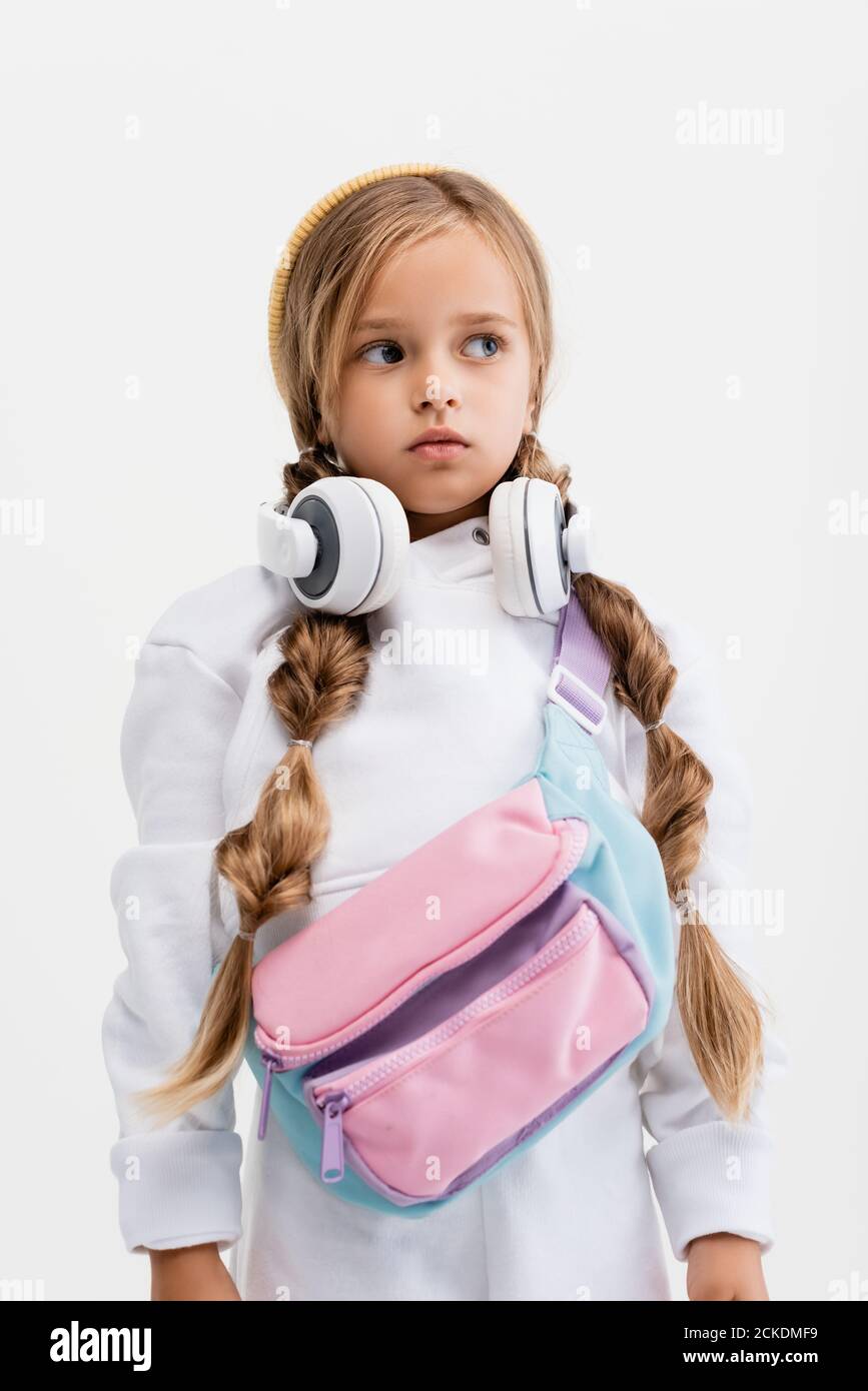 blonde girl in sportswear and headphones isolated on white Stock Photo ...