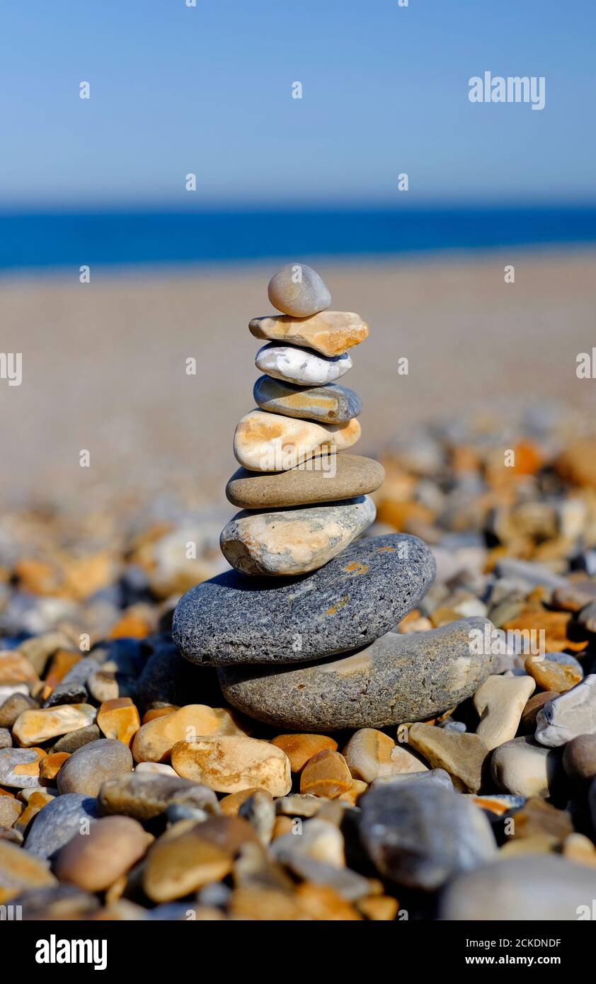 pile of balanced pebbles on cley beach, north norfolk, england Stock ...