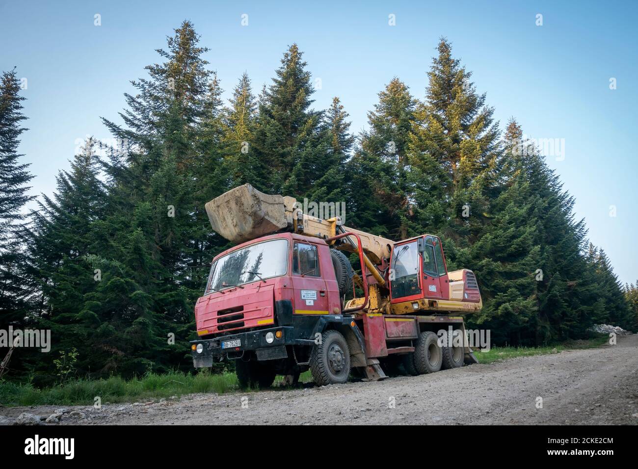 Czech Tatra T815 UDS 214 excavator truck 6x6, in the forest road in ...