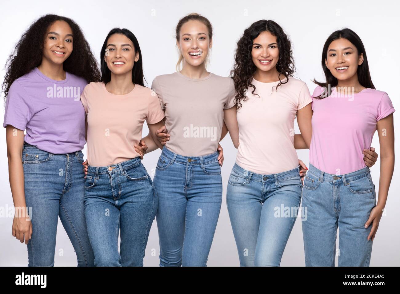 Cheerful Multicultural Ladies Embracing Posing Over White Background ...