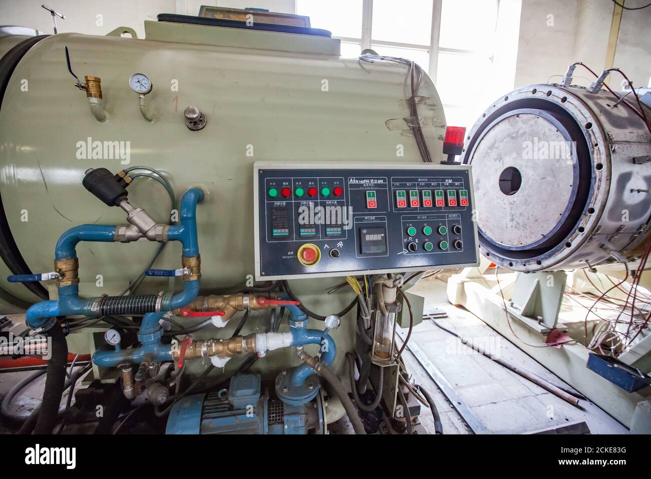 Modern plastic pipes production line equipment. Control panel of line ...