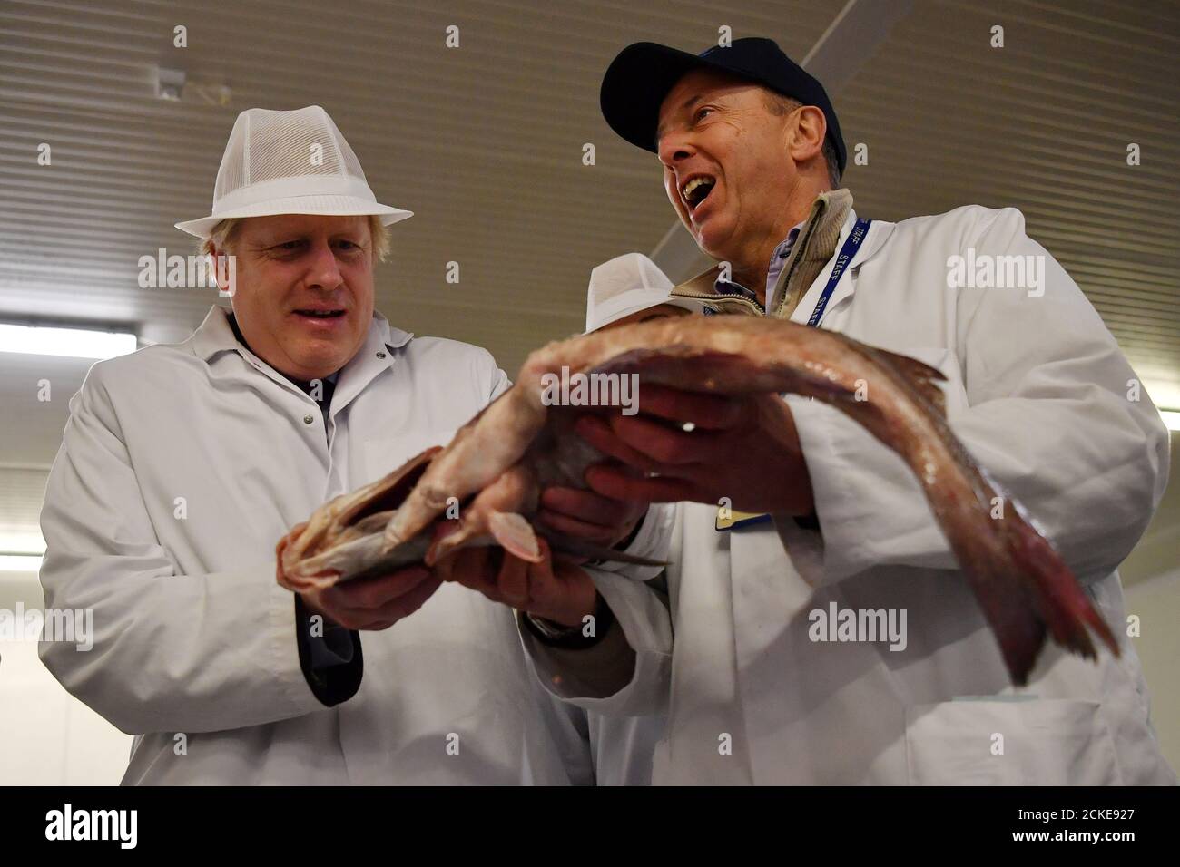 Prime minister boris johnson during visit to grimsby fish market hi-res ...