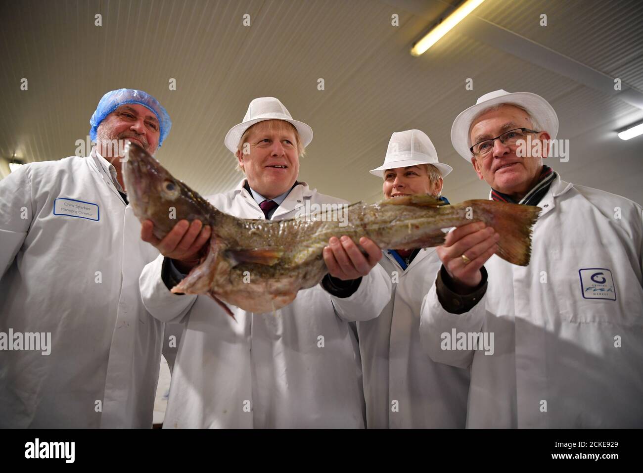 Prime minister boris johnson during visit to grimsby fish market hi-res ...