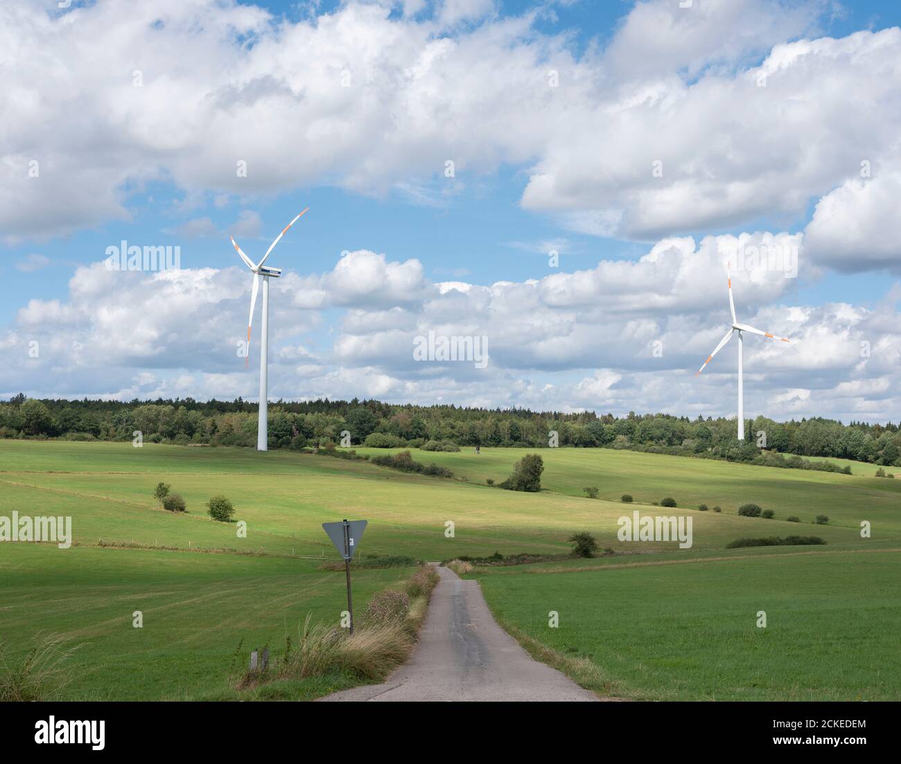 countryside of german eifel with road and wind turbines Stock Photo - Alamy