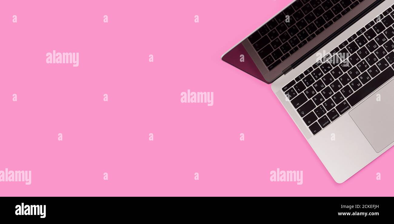 Beauty office desk with laptop notebook on pink background top view ...