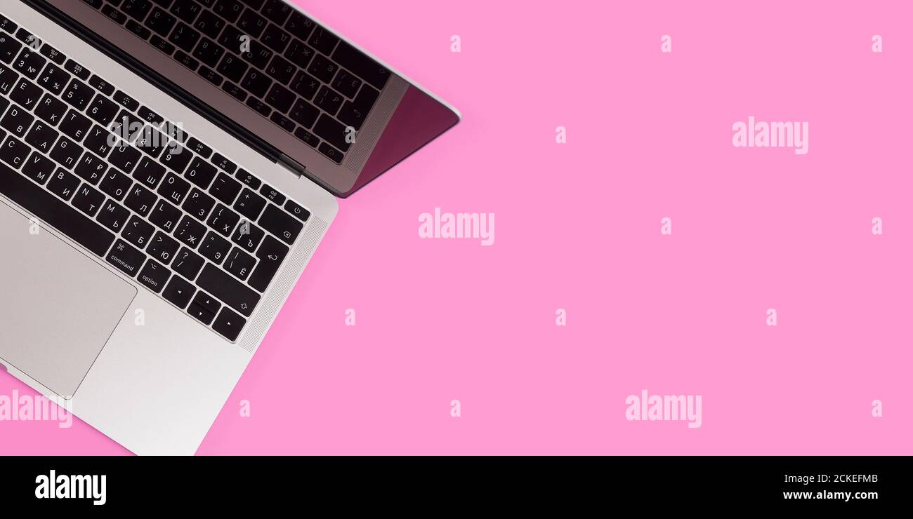 Beauty office desk with laptop notebook on pink background top view ...