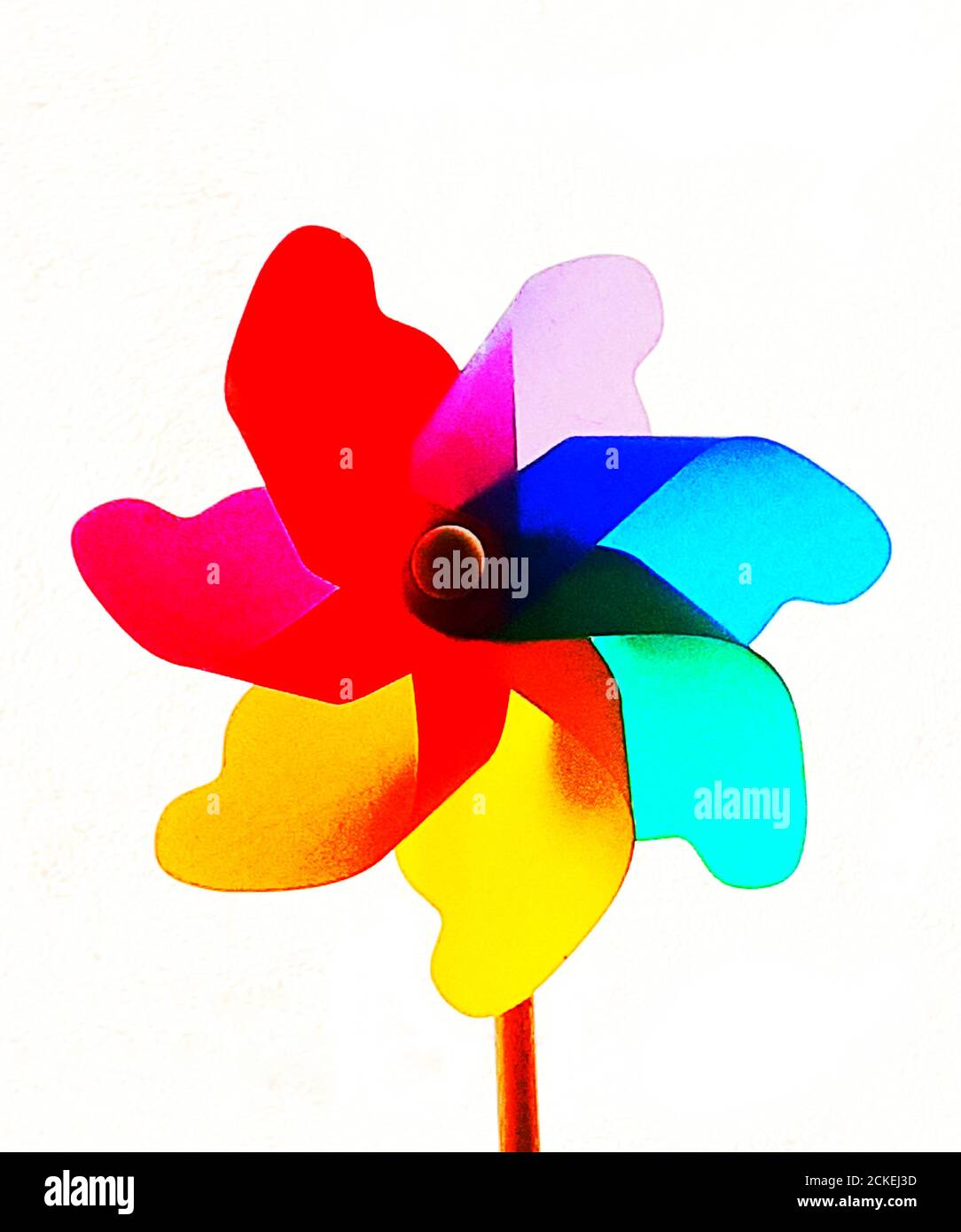 Multi colored pinwheel against white background Stock Photo - Alamy