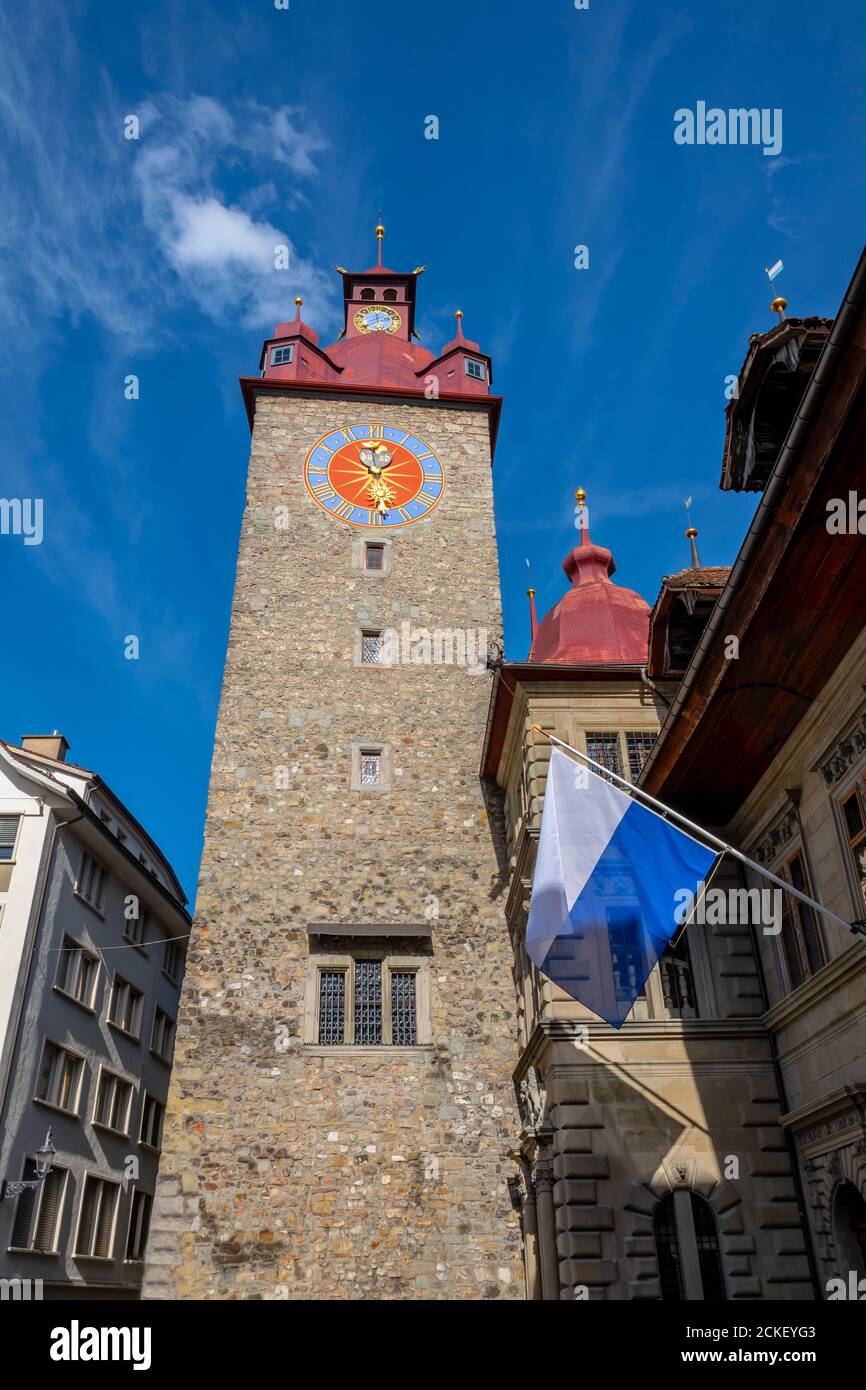 Town Hall of Lucerne with Flag and Blue Sky in Switzerland Stock Photo ...