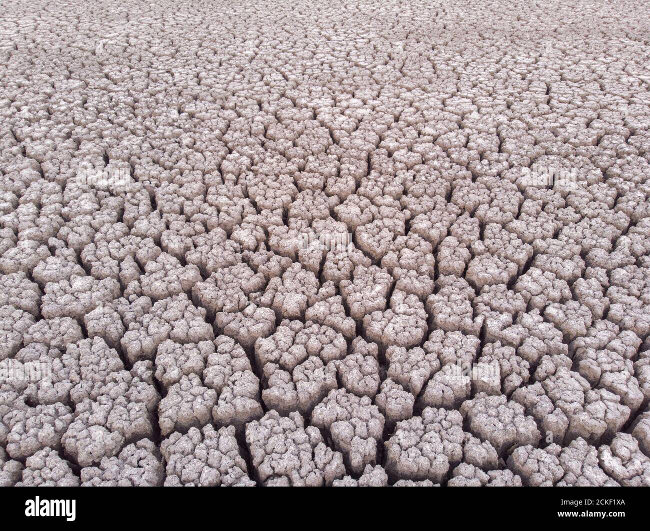 Aerial view of crackled earth texture of the dry lake Stock Photo - Alamy