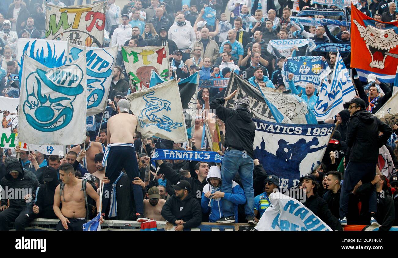 Olympique marseille fans with flags and banners hi-res stock ...