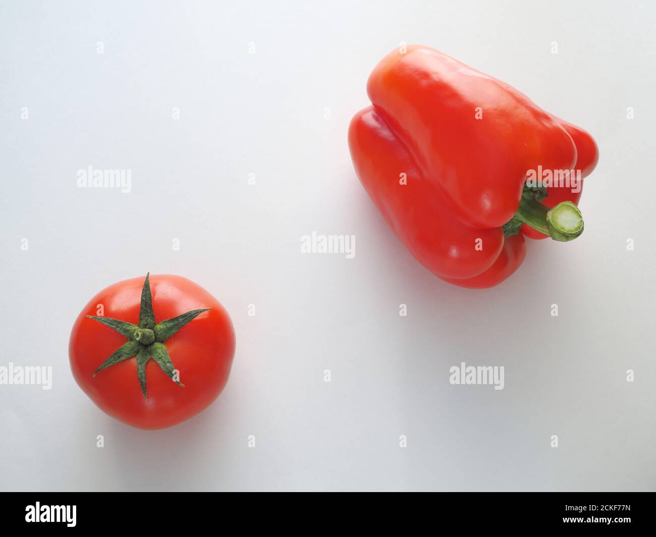 Fresh vegetables. Red tomato and bell pepper sweet Stock Photo - Alamy