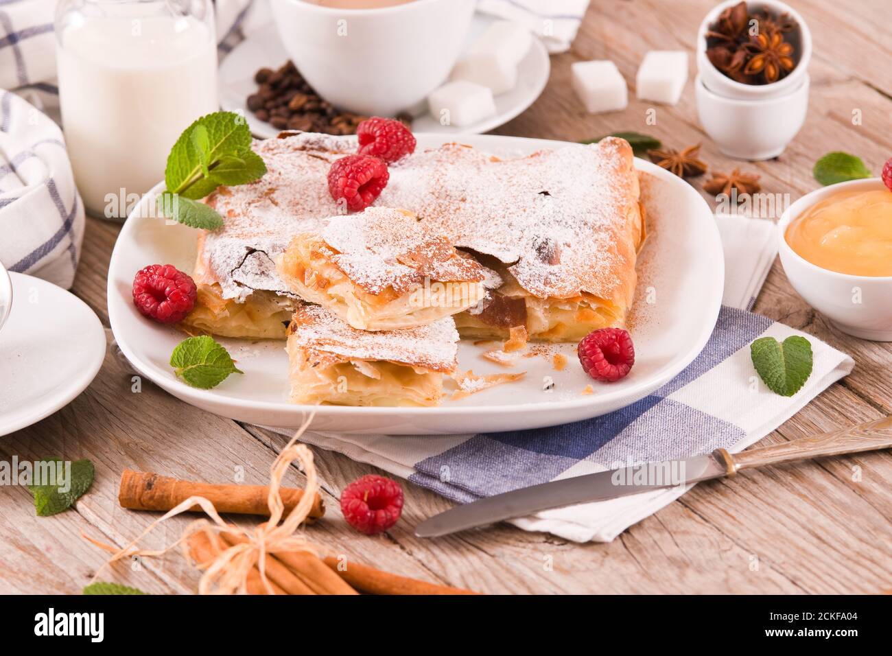 Bougatsa - Greek puff pastry with cream Stock Photo - Alamy
