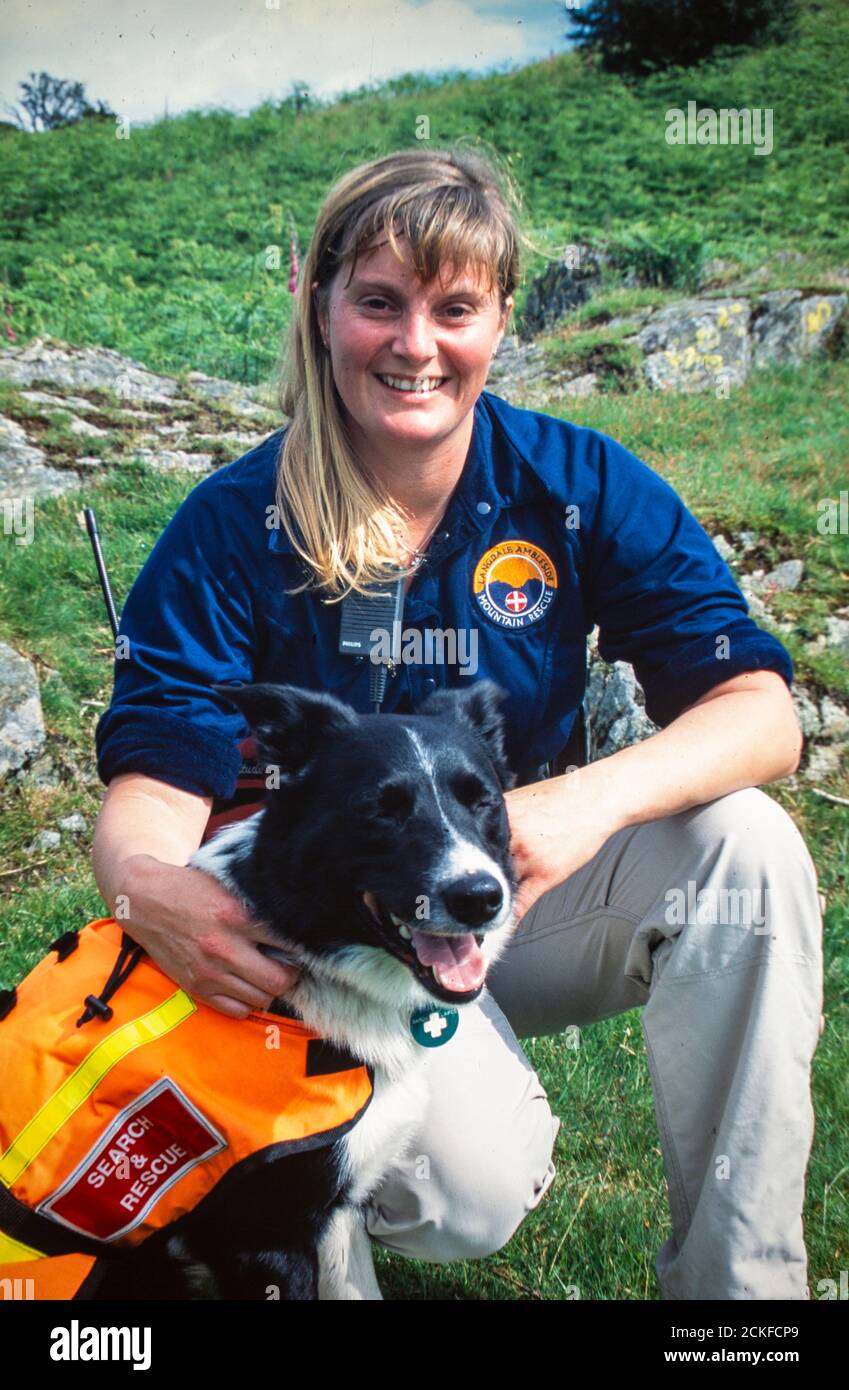 A search dog handler with the Langdale/Ambleside mountain Rescue Team ...