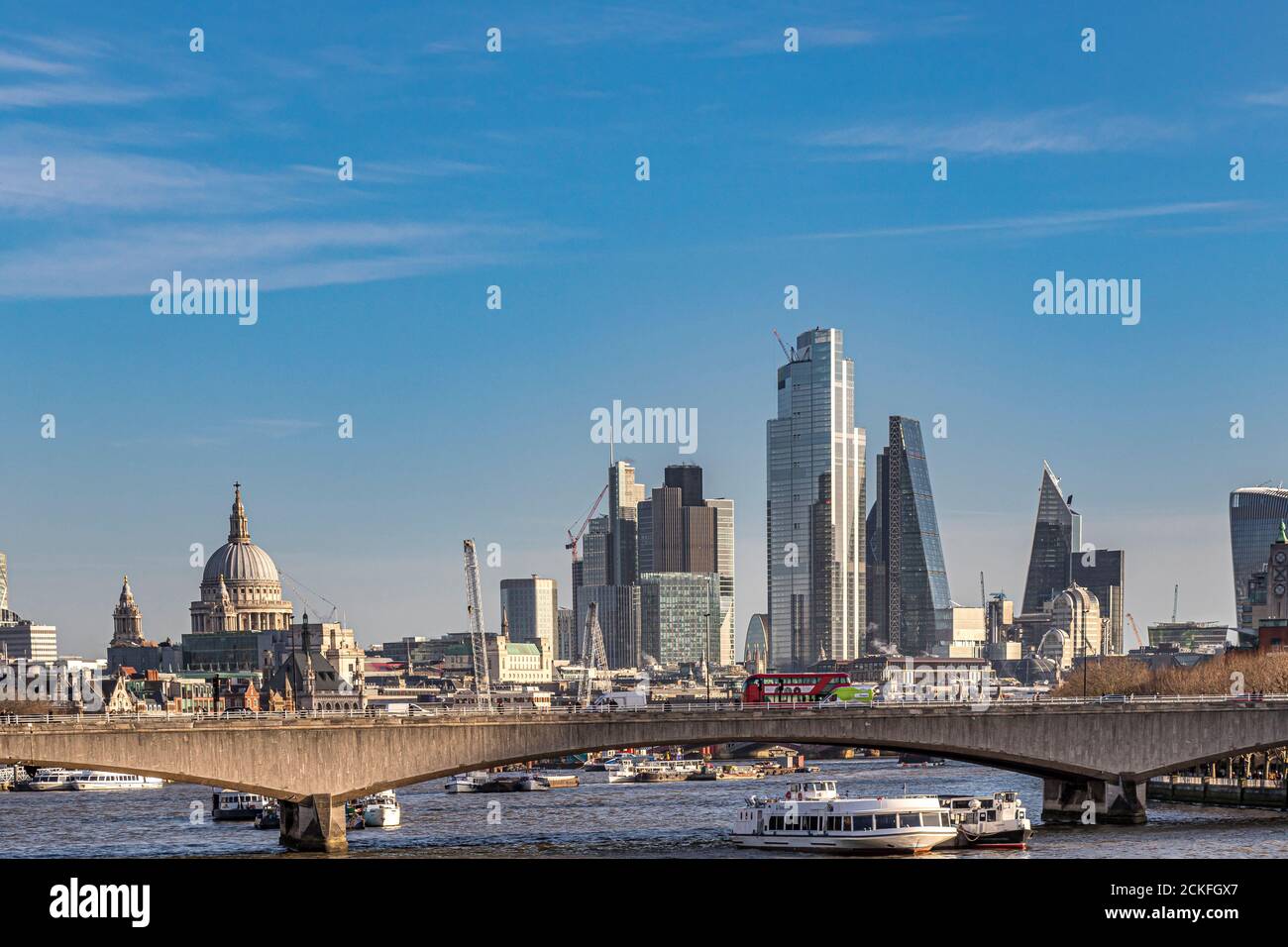 Waterloo Bridge with St Pauls Cathedral and the high rise buildings of ...