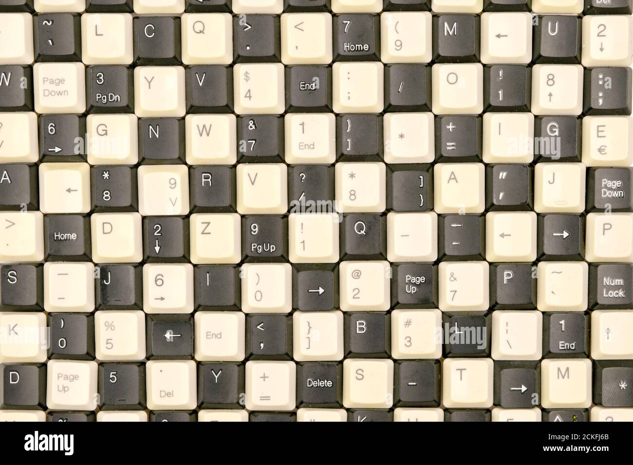 a set of keys from old computer keyboards laid out on the table in a ...