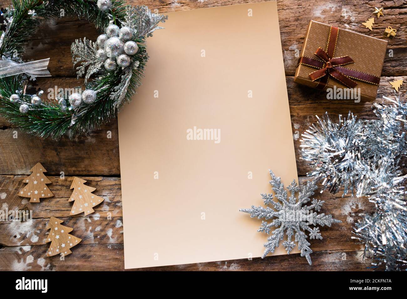 Christmas letter on wooden background with decorations Stock Photo - Alamy