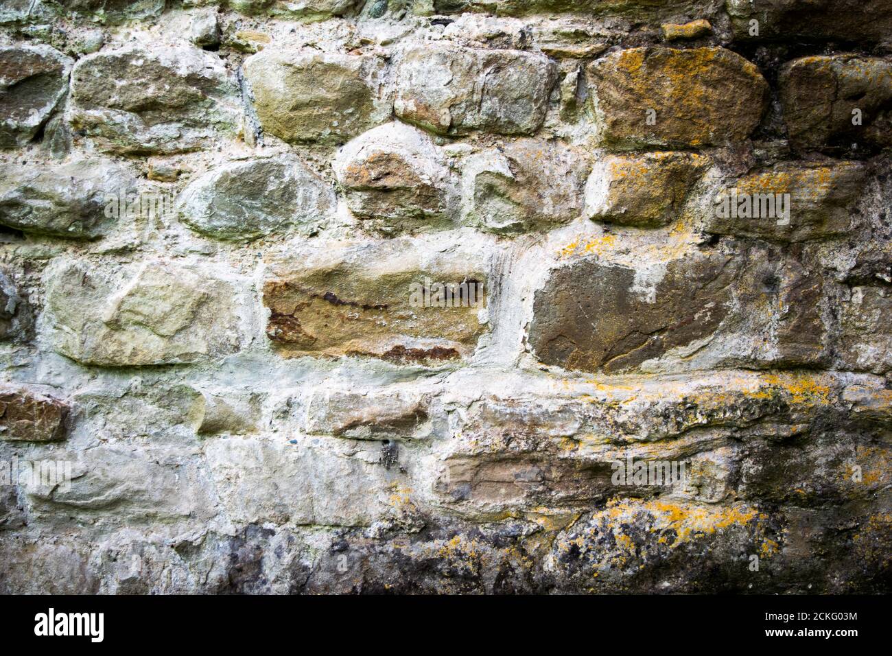 texture of masonry, the fragment of a stone wall of an ancient temple ...