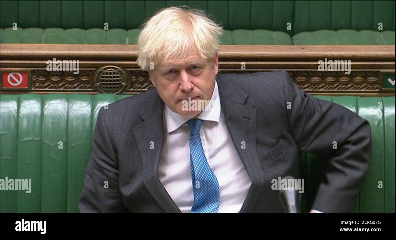 Prime Minister Boris Johnson listens to Deputy Labour leader Angela ...