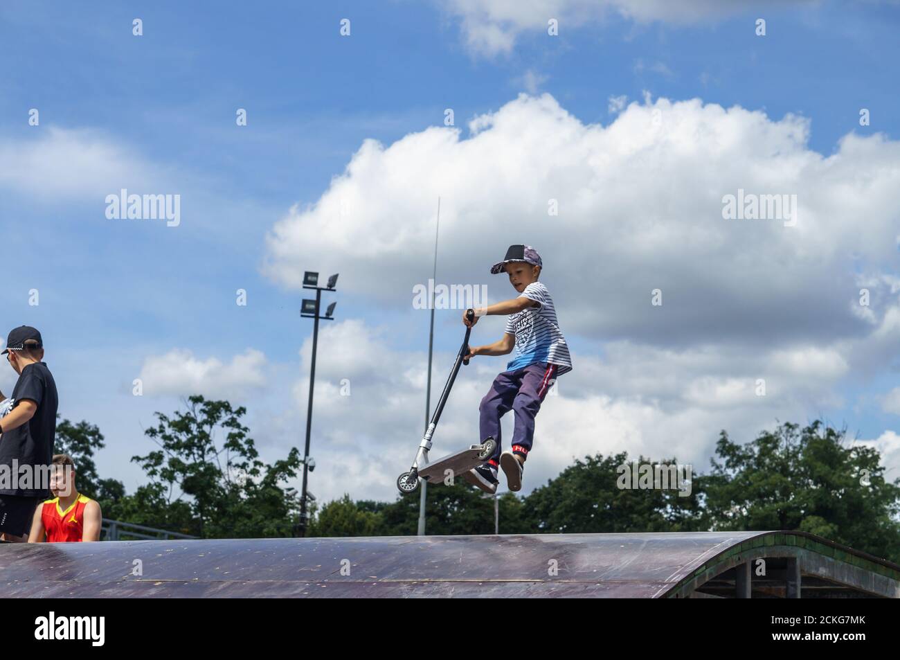 stunt scooters, young people in a skate Park, scooter sport, freestyle ...