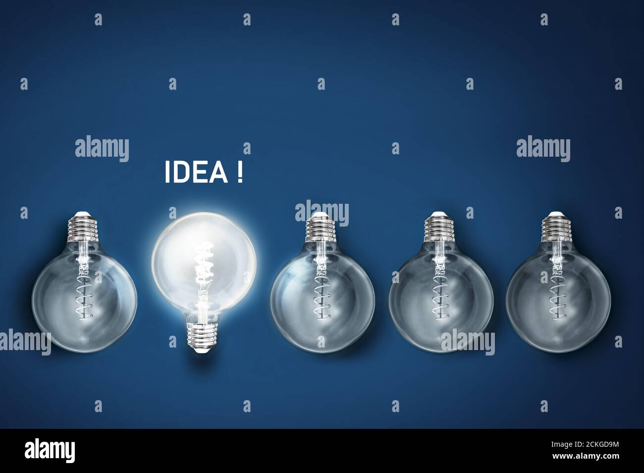 Idea , creativity innovation illuminated light bulb row dim ones ...