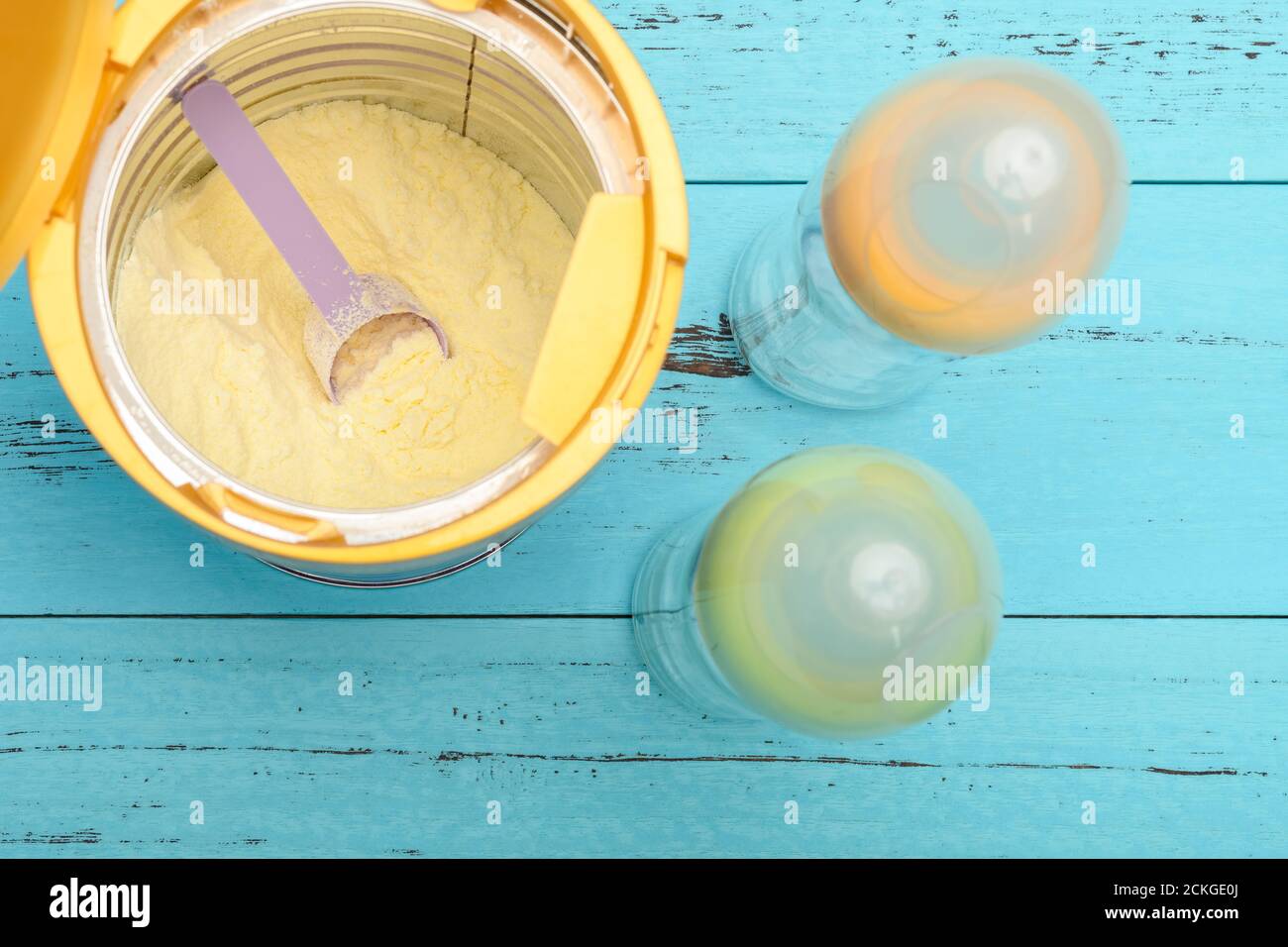 can of powdered milk with two baby bottles Stock Photo - Alamy