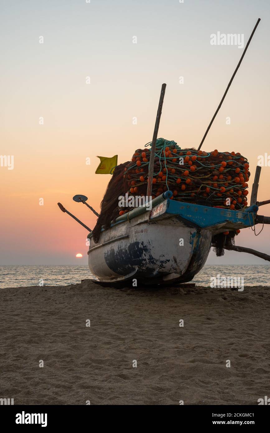 Scenic fishing landscape of Velsao Beach in Goa with Fishing canoe ...