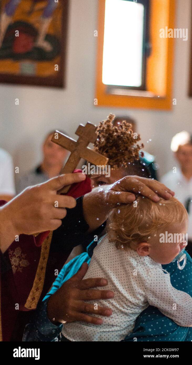 Baptism of the child hi-res stock photography and images - Alamy