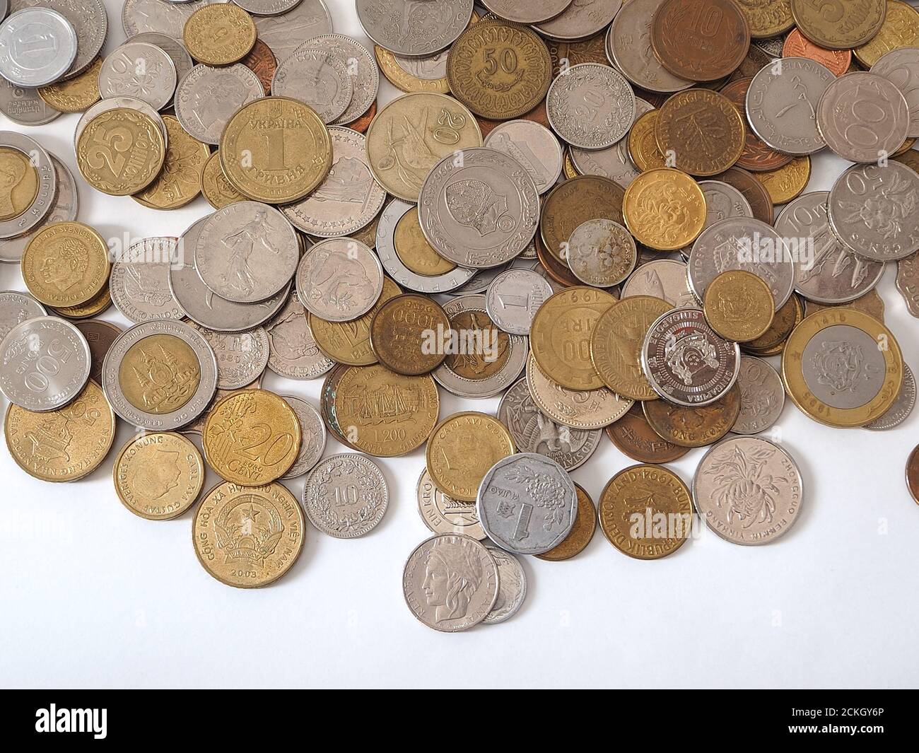 Coins from around the world. International currency Stock Photo - Alamy