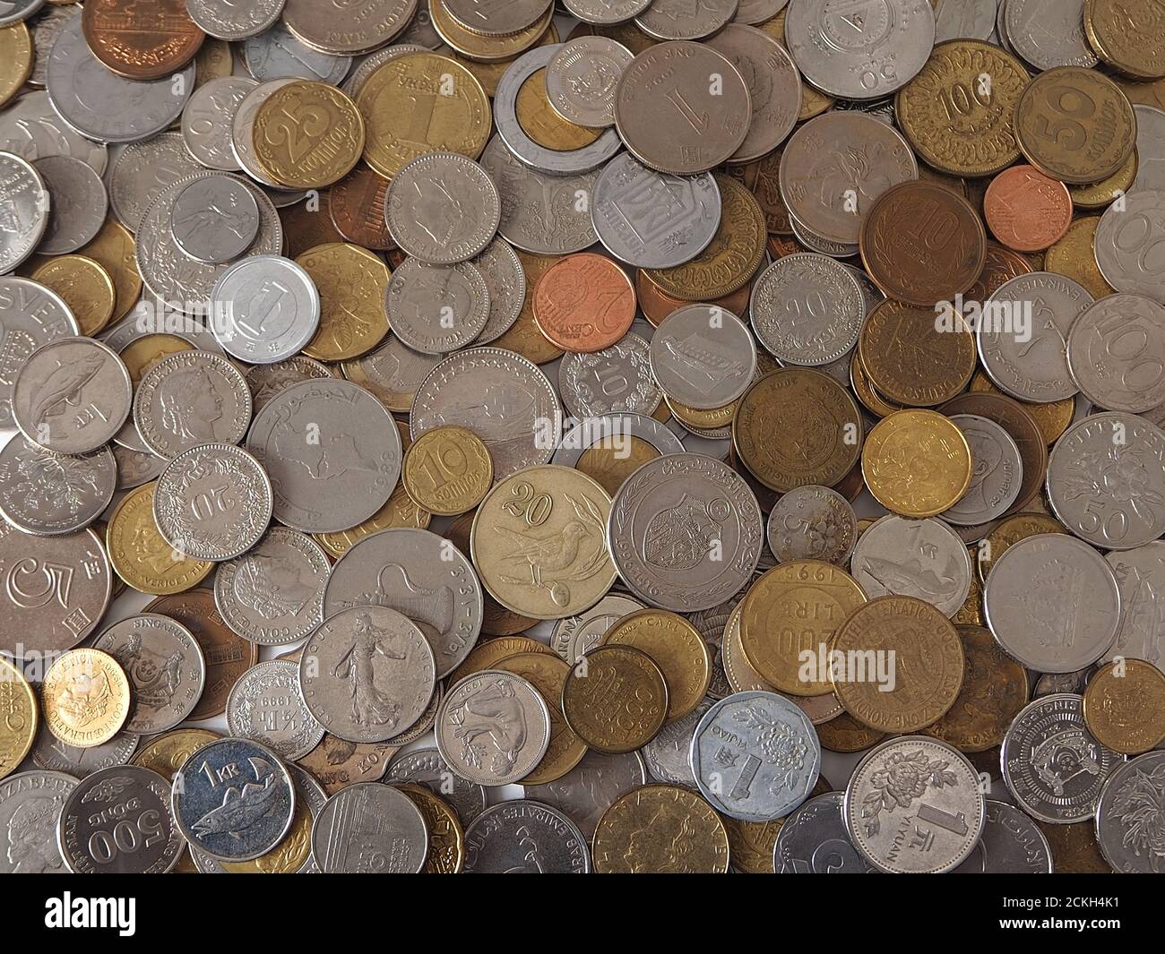 Coins from around the world. International currency Stock Photo - Alamy