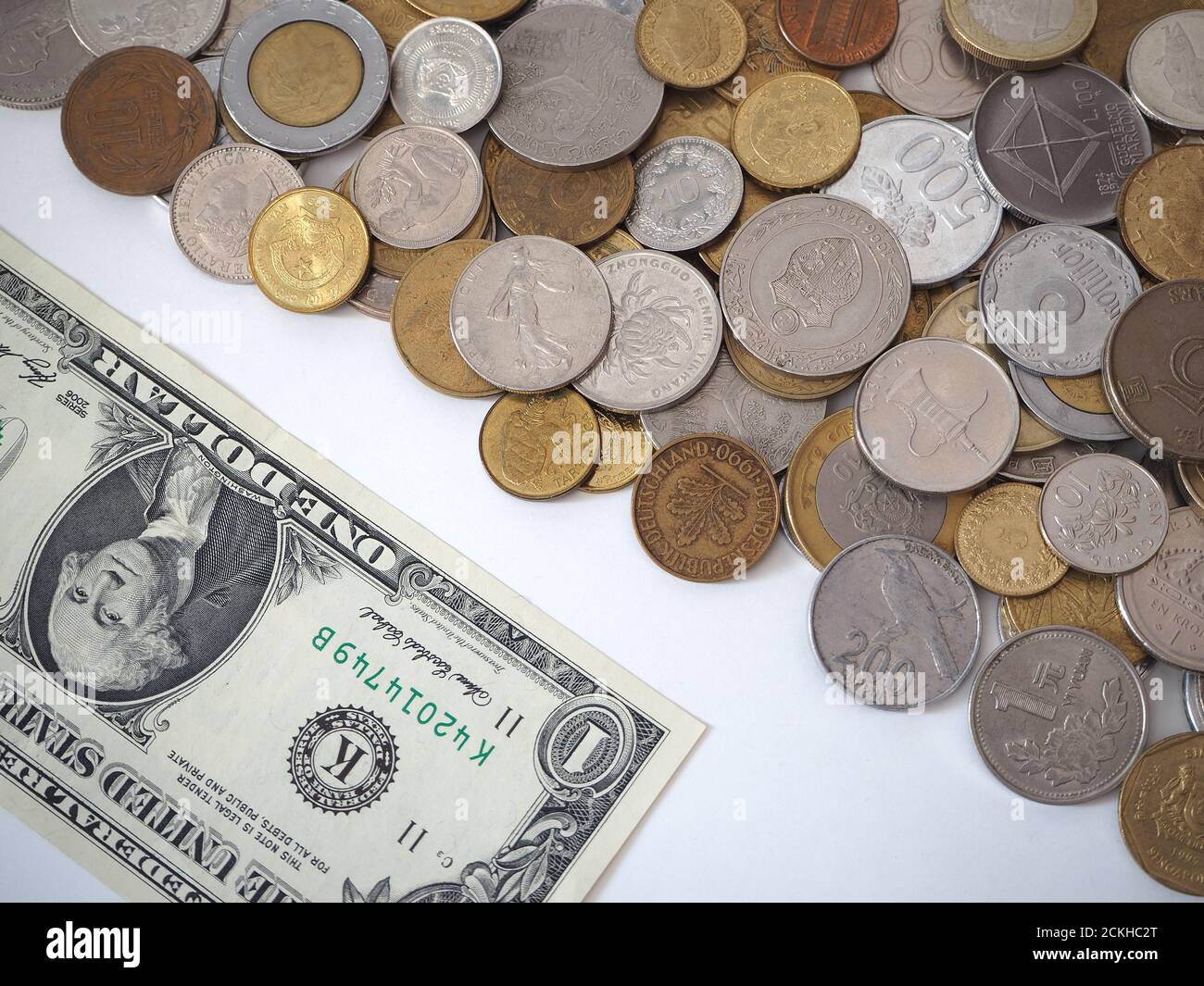 Coins from around the world. International currency Stock Photo - Alamy