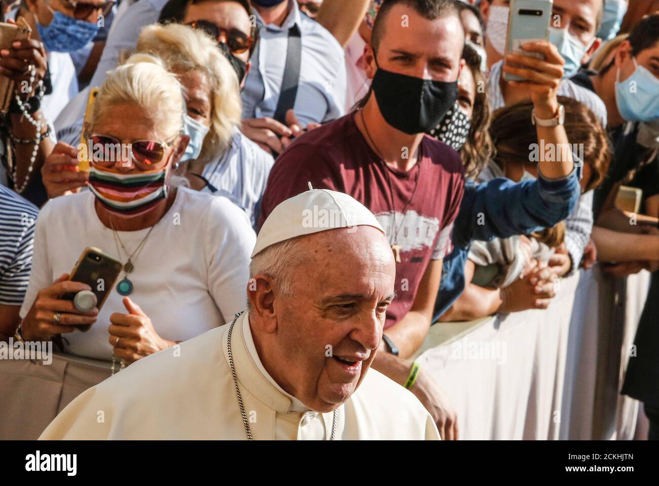 General audience in the saint damaso hi-res stock photography and ...