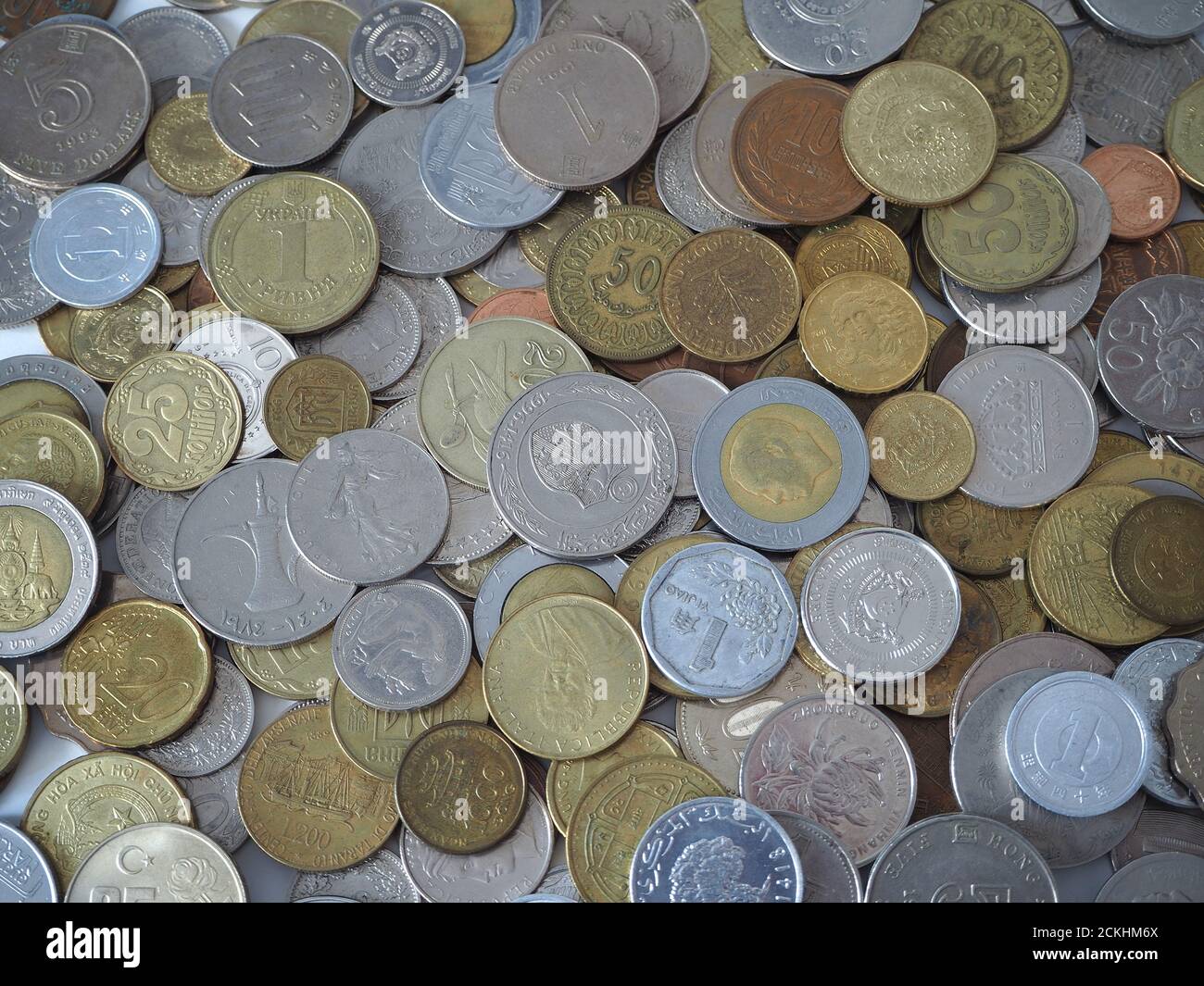 Coins from around the world. International currency Stock Photo - Alamy