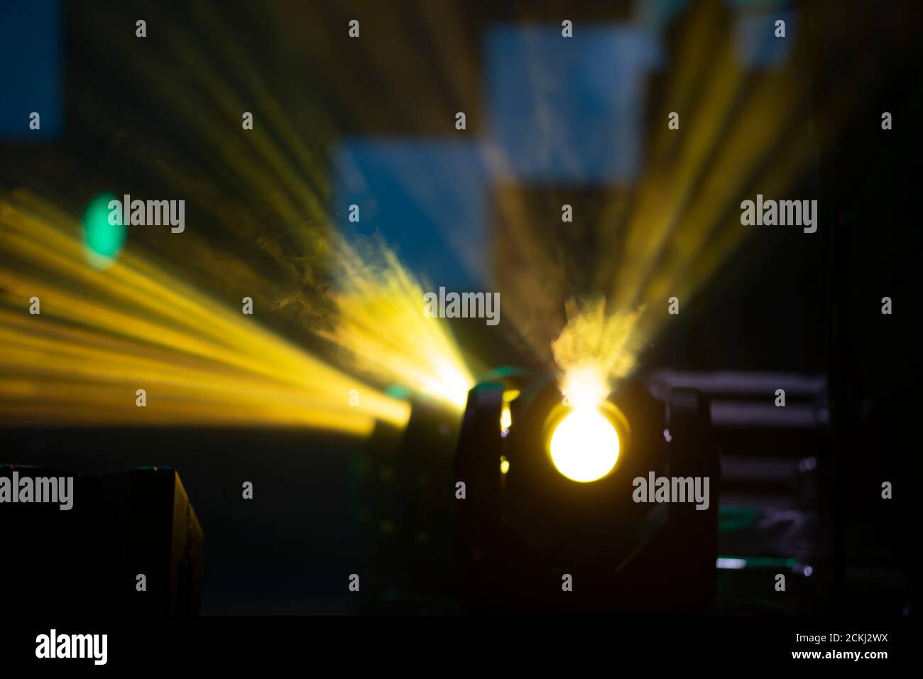 Yellow light of concert spotlights.Beautiful stage background with rays ...