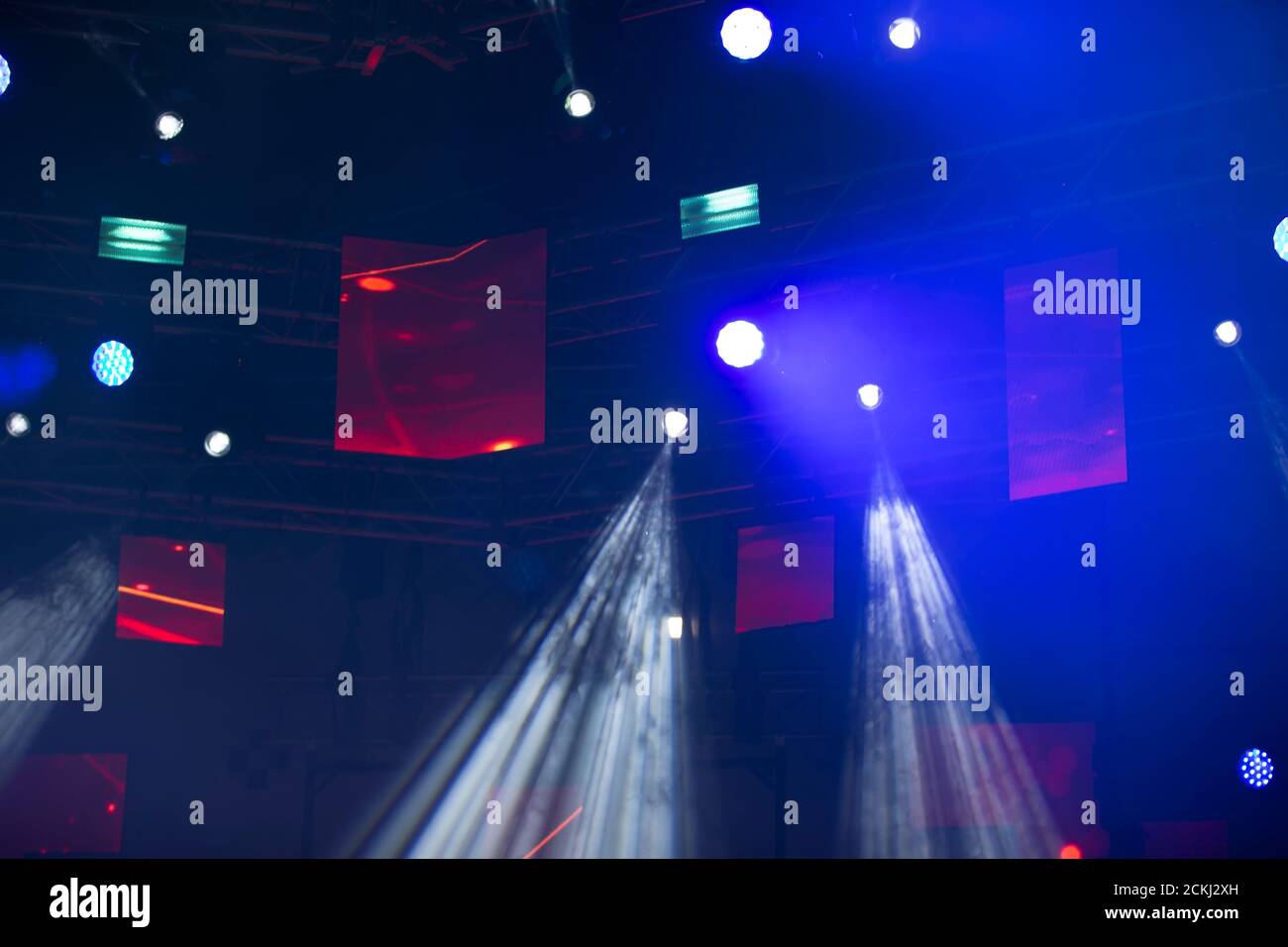 Stage spotlights background light.Concert lighting on a dark background ...